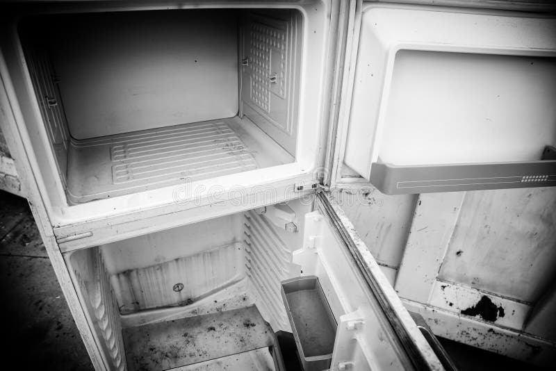Trash dumped refrigerator stock photo. Image of freezer - 258315554