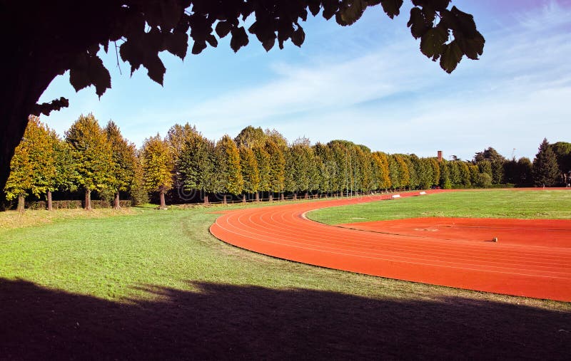 Detail of Red Running Track in a Meadow Stock Image - Image of beauty ...