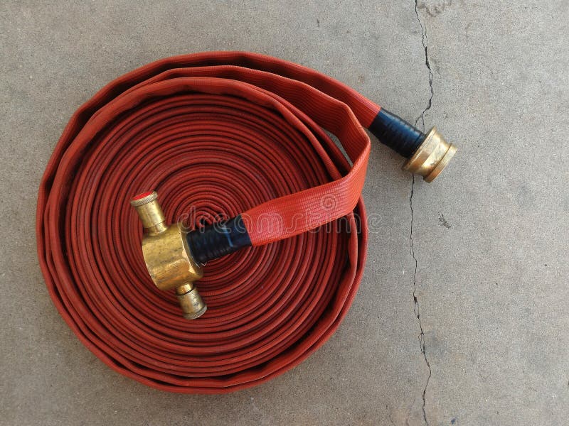 Roll of Old Fire Pipe on Dirty Concrete Ground Stock Photo - Image of ...