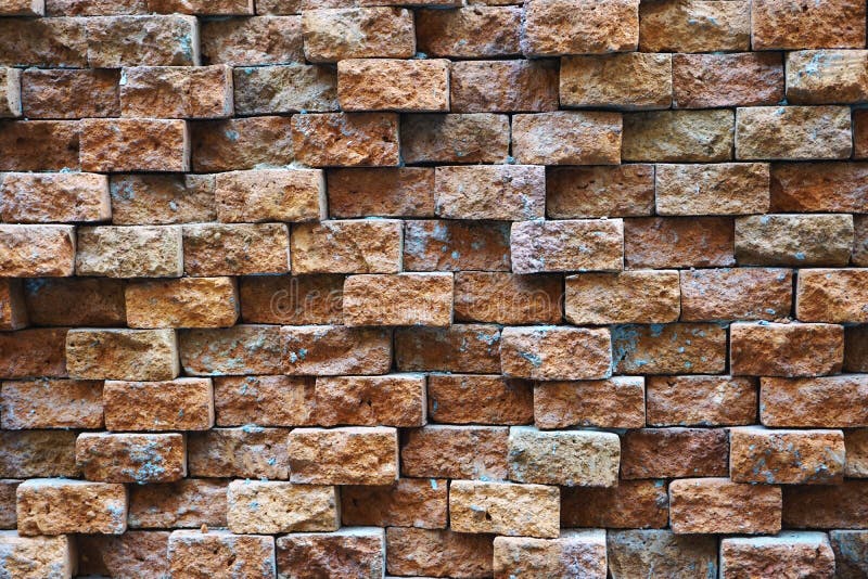 Rough Brick Wall with Pattern of Protruding Bricks Stock Photo - Image ...