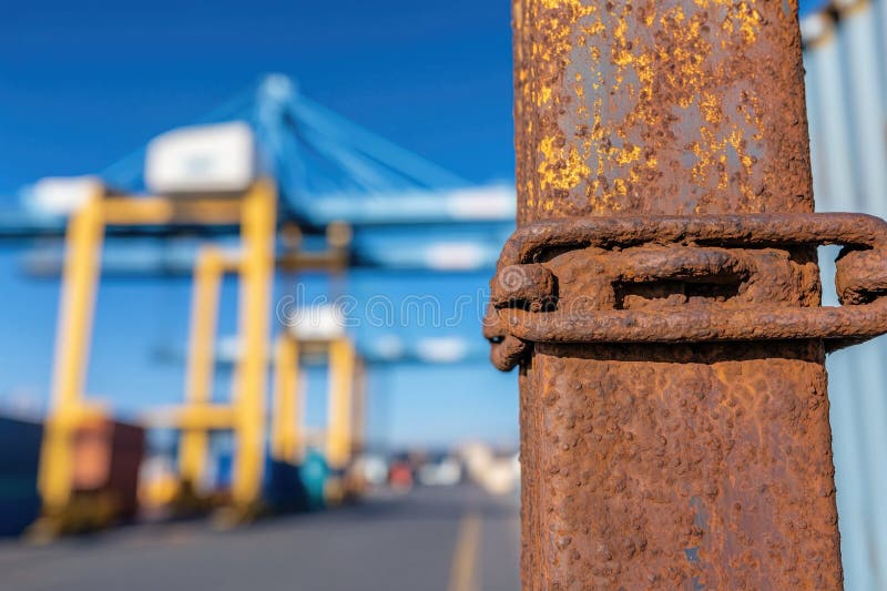 Detail of a Rusty Metal Structure with a Cargo Port and Crane in the ...