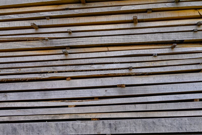 Detail of Raw Lumber in a Horizontal Stack Weathered Wooden Boards for Construction Sawn Timber ...