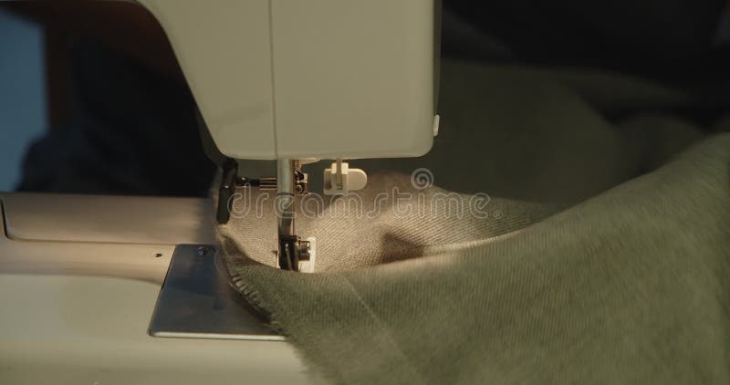 Close-up View of a Sewing Machine Sewing Clothes Stock Footage - Video ...