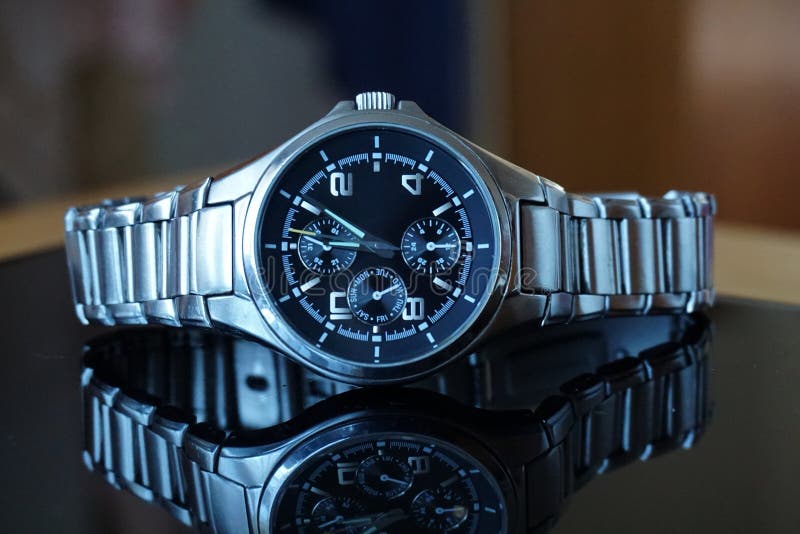 Detail of Silver Watch after Midday, Laying on the Black Pad Stock ...