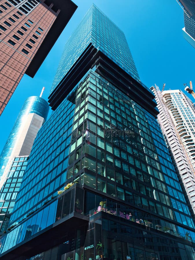 Detail of a Skyscraper with a Glass Front and an Architectural Feature ...
