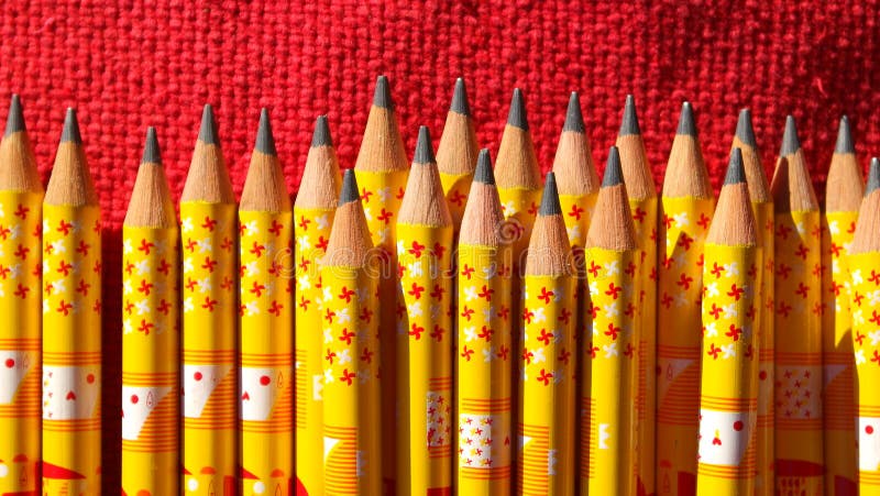 Detail of Some Yellow Pencils with Red Background Stock Image - Image ...