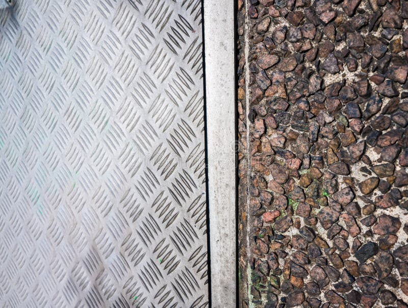 Detail of a Stone Pebble Wall and Aluminium Plate.. Stock Photo - Image ...