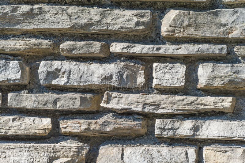 Detail of stone tile wall stock photo. Image of stone - 291814194