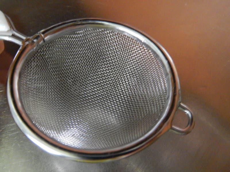 Detail of a tea sifter net stock image. Image of silver - 86565137