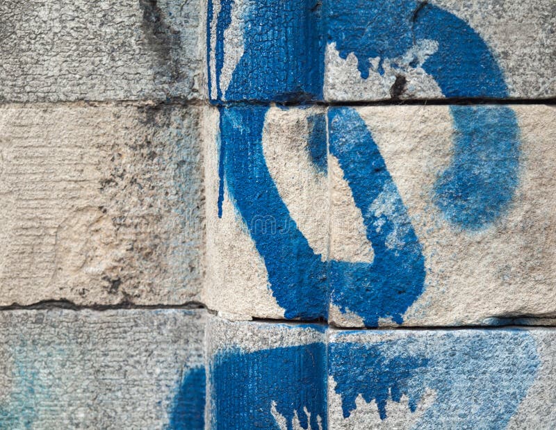 Detail of Textured Stonework with Blue Graffiti Stock Image - Image of ...