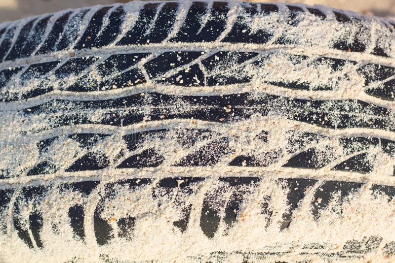Detail of tire with sand stock photo. Image of muddy - 54040264