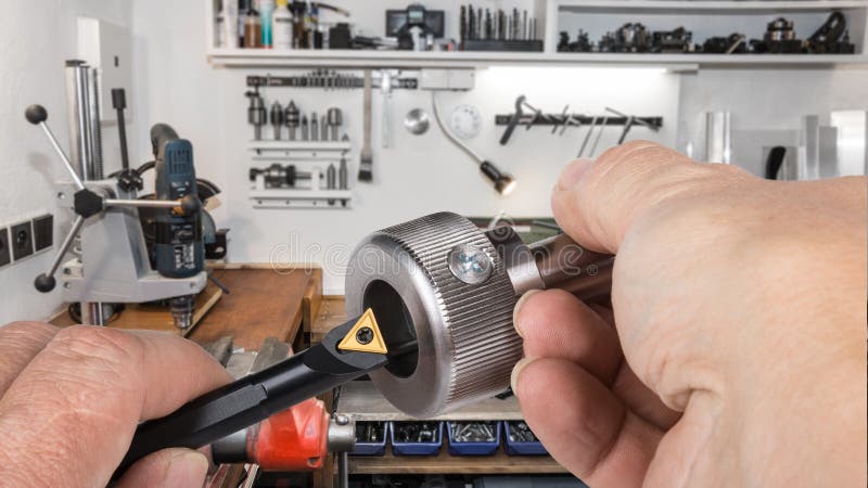 Detail of Tool Bit and Metallic Bolt in Workman`s Hands Stock Photo ...