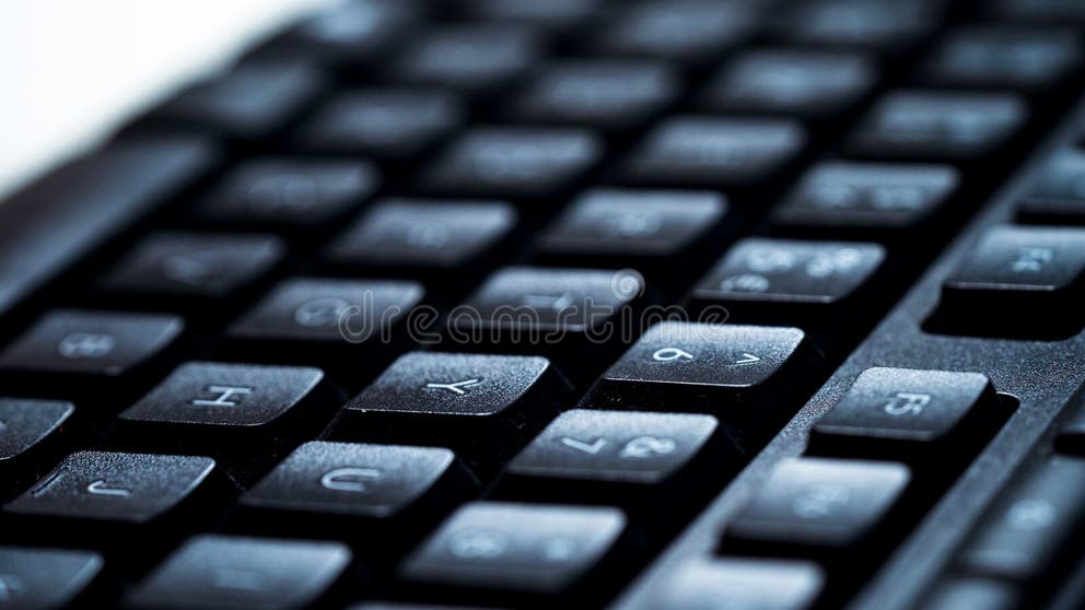Detail View of Desktop Computer Keyboard with Light Shining on Keys. Stock Image - Image of keys ...