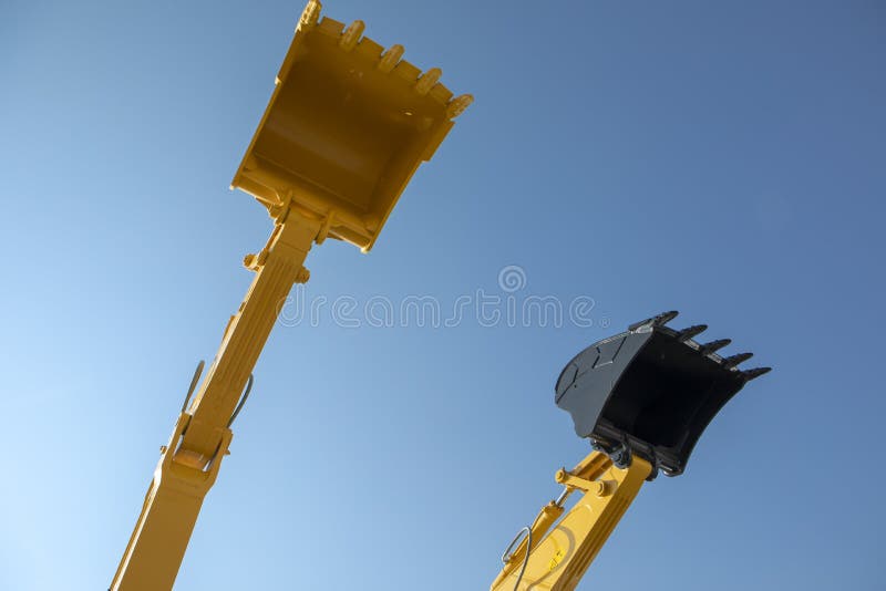 Diggers on the blue sky stock photo. Image of excavator - 182347110