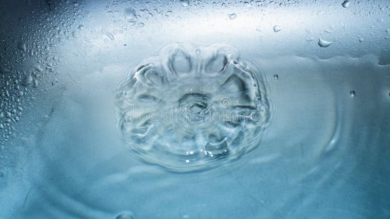 Detail of Water Drop Falling into Water Surface Stock Photo - Image of ...