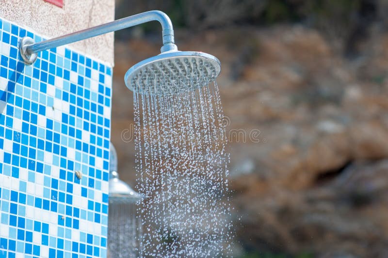 Detail of a Water Shower on the Beach in Horizontal Composition Stock ...