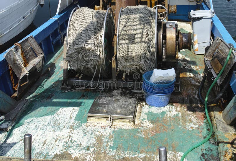 Detail of winch with net stock photo. Image of nautical - 70442766