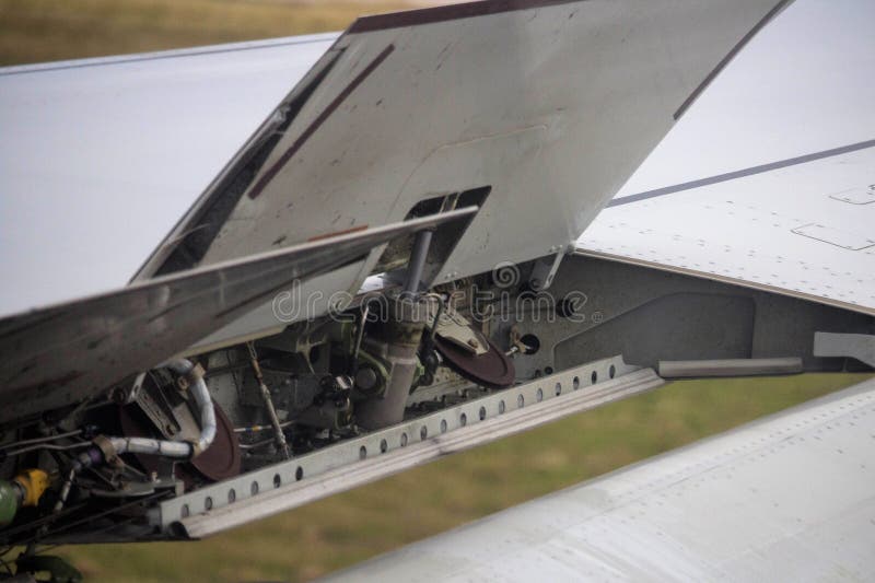 Detail of the Wing of an Airplane with Flaps in Motion Stock Image ...