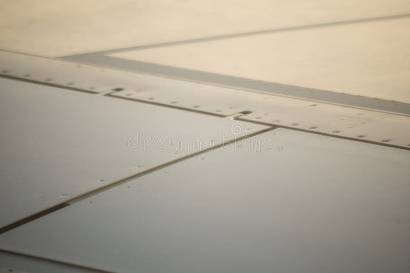 Detail of the Wing of an Airplane Stock Image - Image of material ...