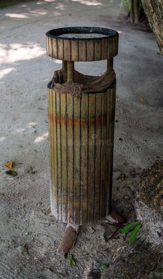Detail of a Wooden Circular Trash Can on a Sandy Path Stock Image ...