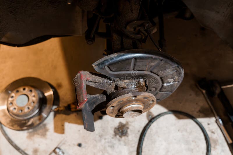 Detailed Close-Up of Automotive Brake System Components in a Workshop ...