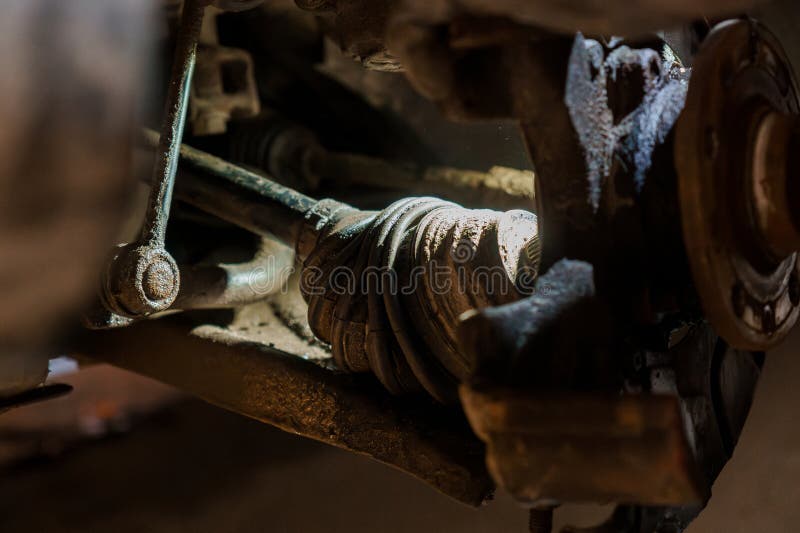 Detailed Close-Up of a Car& X27;s Suspension System Components in Dim ...