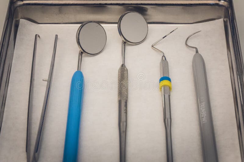 Detailed Close Up of Different Dental Instruments and Tools on a ...