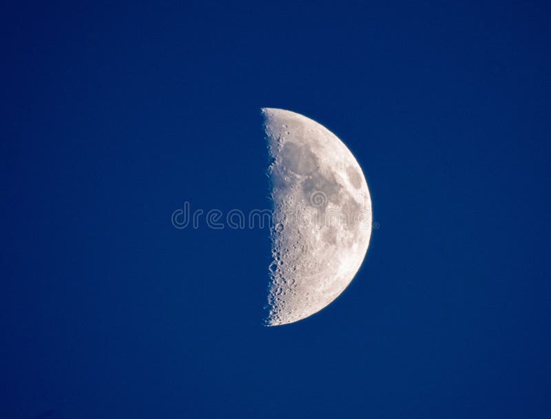 Detailed Close-up of a Half Moon in a Clear Night Sky Stock Image ...