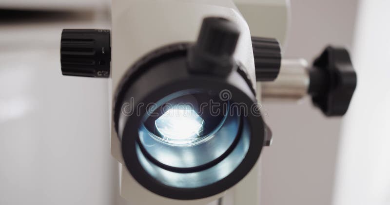 Close-Up View of a Microscope in a Bright Laboratory Setting Stock ...