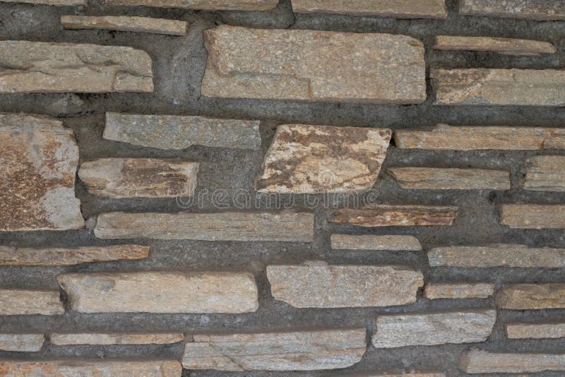 Rustic Stone Wall Texture with Varying Sizes and Colors of Stones and ...