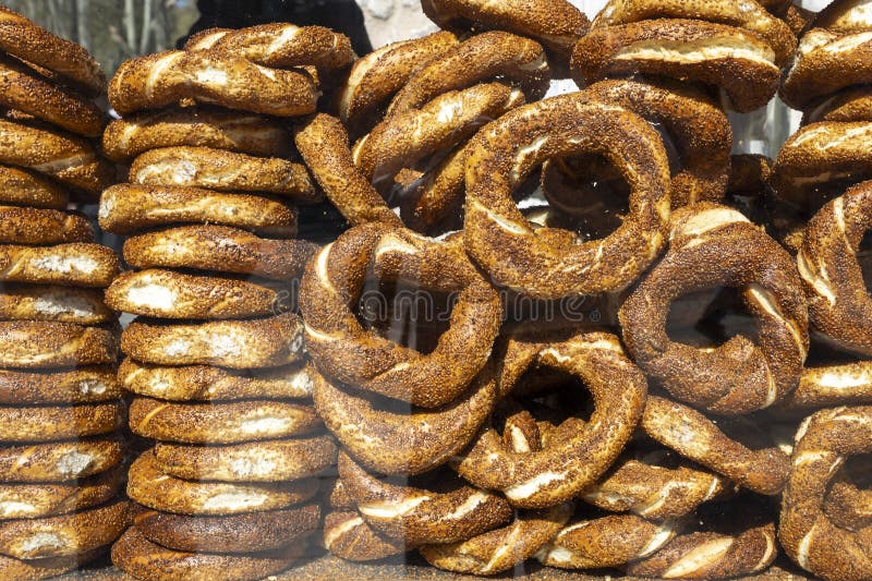 A Detailed Close-up Shot Showcases a Large Stack and Pile of Simit ...