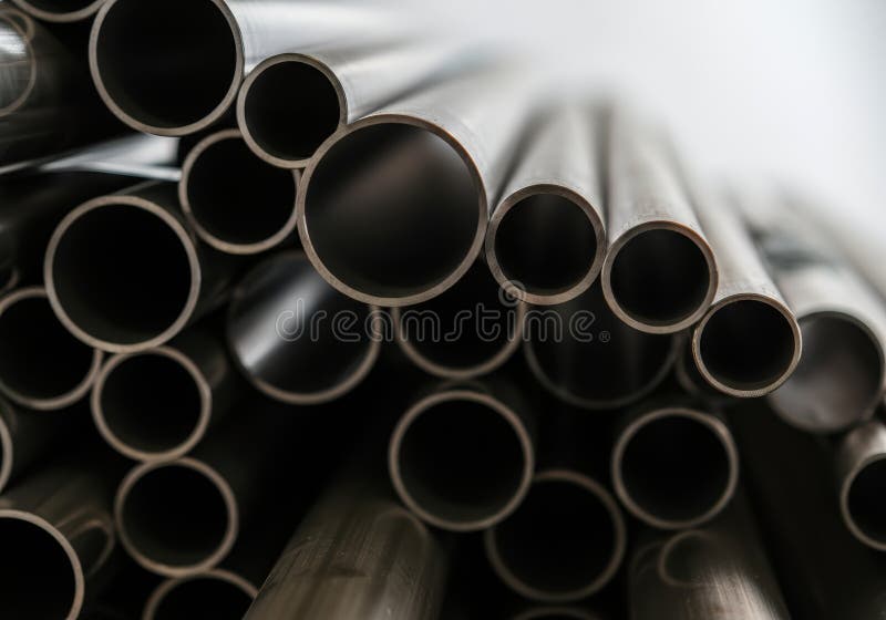 Close-up of Metal Pipes Stacked in Various Sizes and Shapes Stock Image ...