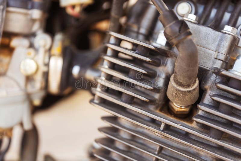 Detailed Close Up View of a Motorcycle Engine Featuring a Spark Plug ...