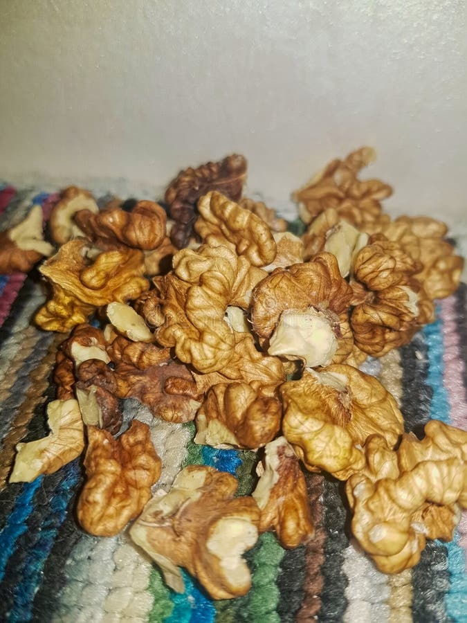 Walnut and Walnut Kernel on a Wooden Table. Stock Image - Image of ...
