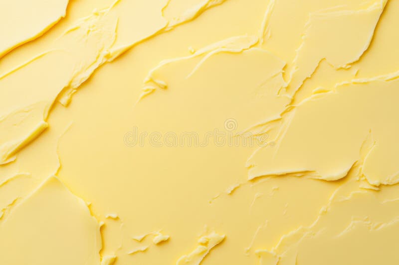 A Detailed Close-up of a Yellow Textured Paint Surface Against a White ...