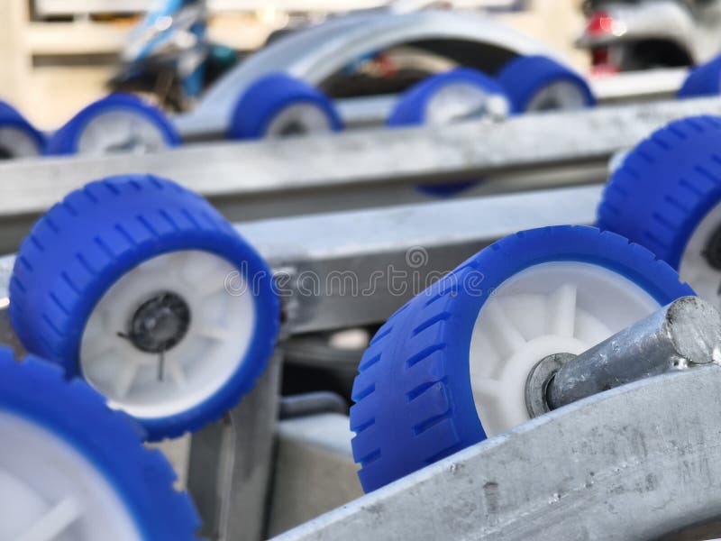 Detailed Closeup of a Boat Trailer that Features Striking Blue Wheels ...
