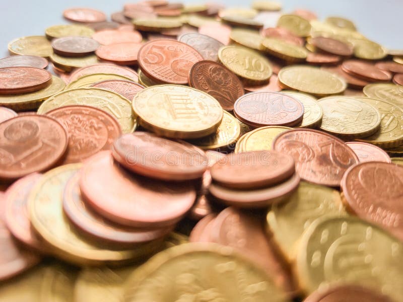 A Variety of Different Coins Piled Together, Displaying Their Unique ...