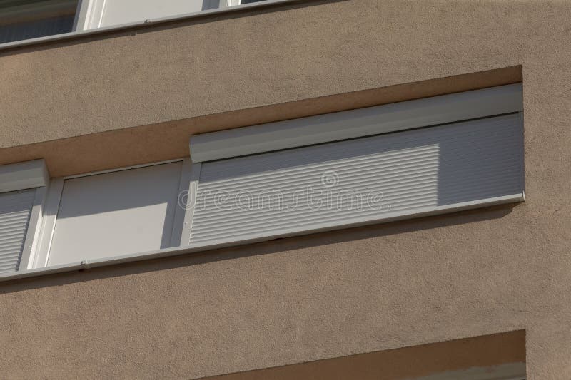 A Detailed Closeup View of a Building Featuring Numerous Windows Stock ...