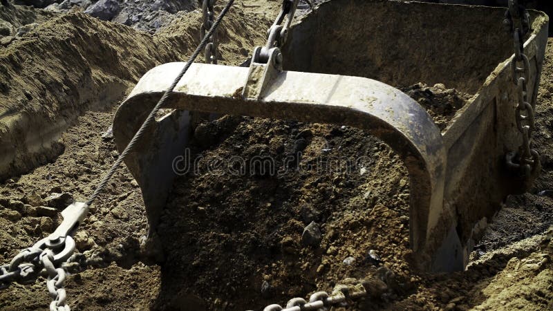 Observe the Powerful Heavy Machinery Digging Equipment As it Operates ...