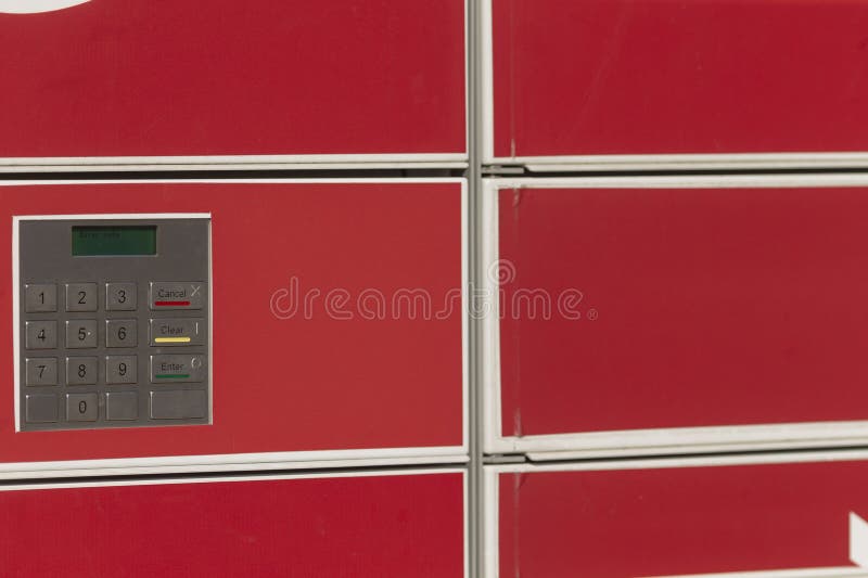 A Detailed Closeup View of a Vibrant Red Locker Featuring a Keypad ...