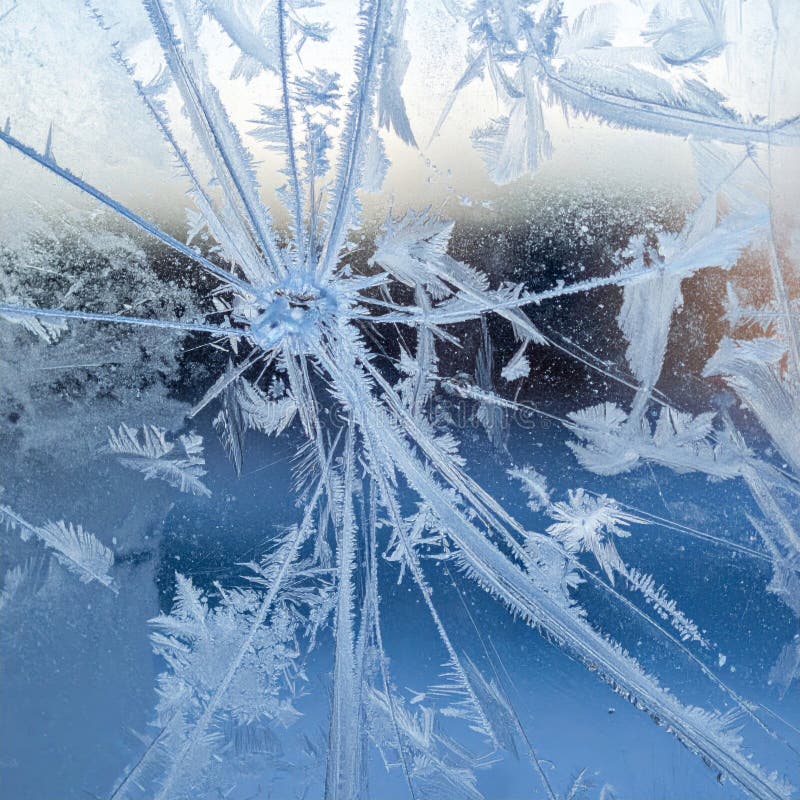 Detailed Ice Crystal Formations on Glass with Blue Tints and Delicate ...