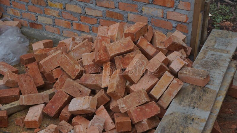 Stack of Bricks at a House Under Construction Stock Photo - Image of ...