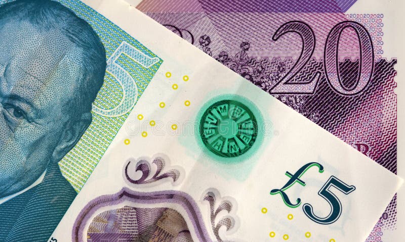 Detailed Macro of Overlapping £5 and £20 British Polymer Banknotes ...