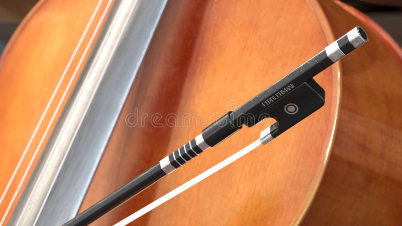 Classic String Instrument Bow on Cello Body Stock Image - Image of ...