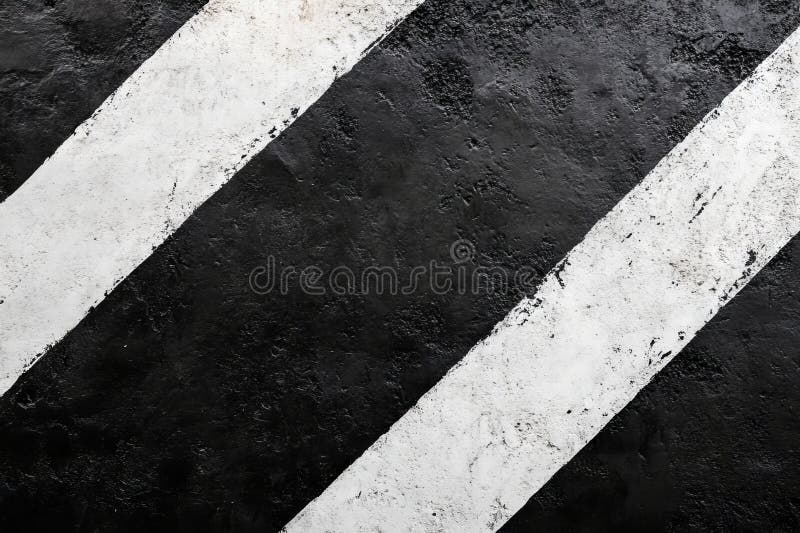 A Detailed Shot of a Rough White Wall Featuring a Black Diagonal Line ...