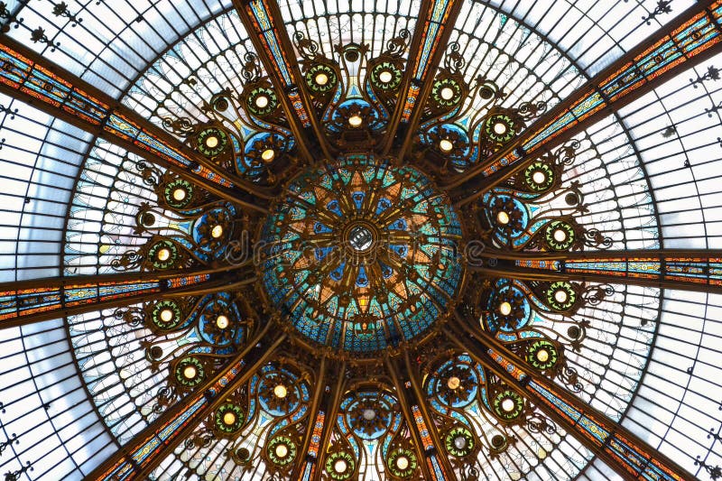 The Detailed Stained Glass Dome with Vibrant Blue and Gold Patterns ...