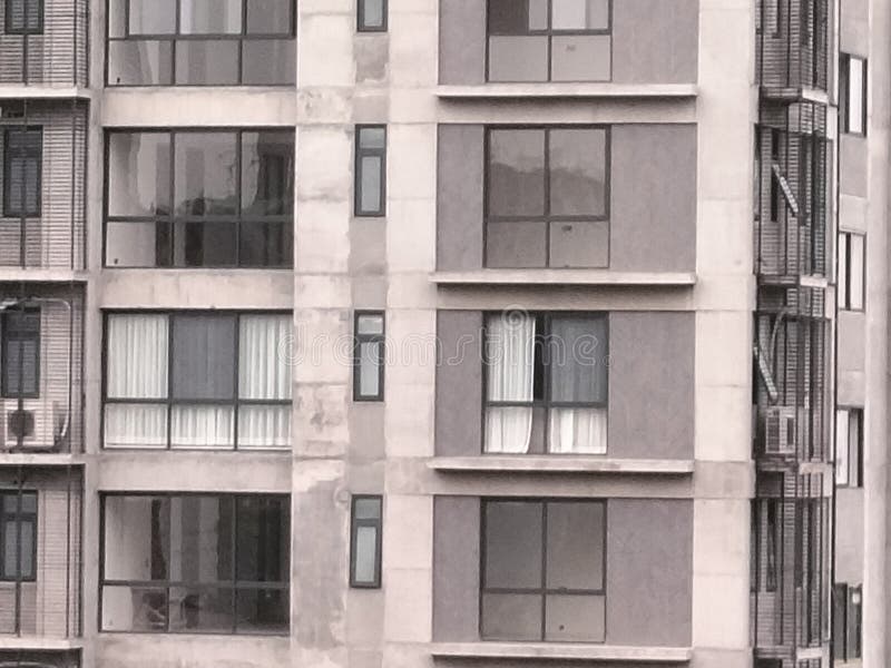 Detailed Texture of Building Windows, Displaying Architectural Patterns ...