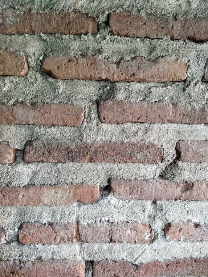 Detailed Texture of an Old Rustic Brick Wall with Weathered Patterns and Natural Imperfections ...
