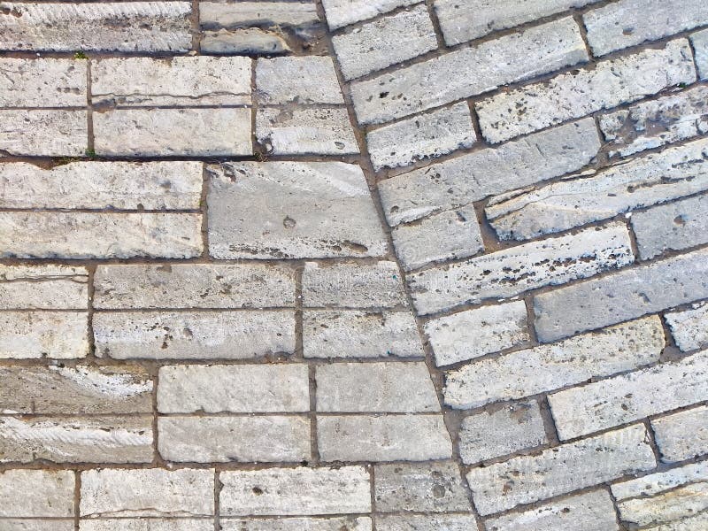 Detailed Textured Background Featuring Gray Bricks Arranged in a Unique ...