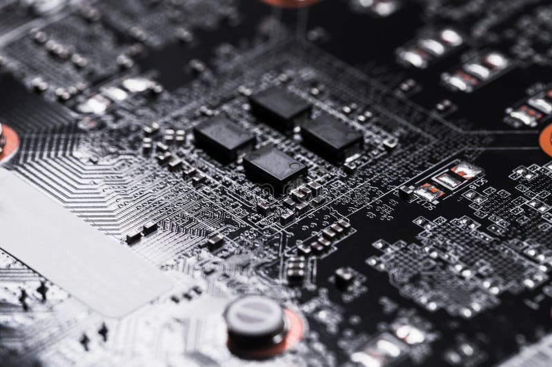 Detailed View of a Circuit Board Featuring Intricate Pathways and ...
